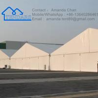 China Large Aluminum Frame Industrial Storage Tent 3-80m Width with 75kg/sqm Snow Load Capacity and White PVC Cover for sale