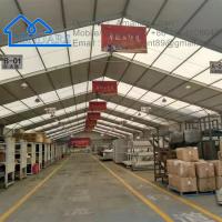 China Large Aluminum Frame Industrial Storage Tent 3-80m Width with 75kg/sqm Snow Load Capacity and White PVC Cover for sale
