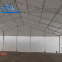 China Large Aluminum Frame Industrial Storage Tent 3-80m Width with 75kg/sqm Snow Load Capacity and White PVC Cover for sale