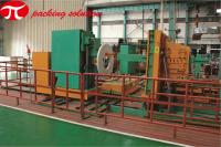 China Easy Operation Automatic Vertical Steel Coil Packaging Line With Coil Stacking & Tilting System for sale