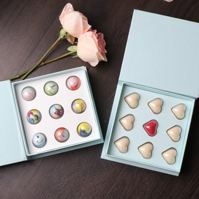 China Wholesale Luxury Custom food chocolate bonbon magnetic closure boxes packaging book shape with plastic inserts tray and for sale