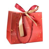 China Offset Printing Custom Paper Gift Bags Gift Shopping Bag With Handle And Ribbon for sale