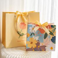 China Offset Printing Custom Paper Gift Bags Gift Shopping Bag With Handle And Ribbon for sale