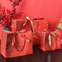 China Offset Printing Custom Paper Gift Bags Gift Shopping Bag With Handle And Ribbon for sale