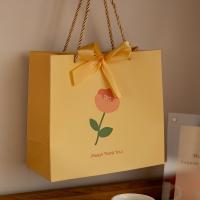 China Offset Printing Custom Paper Gift Bags Gift Shopping Bag With Handle And Ribbon for sale
