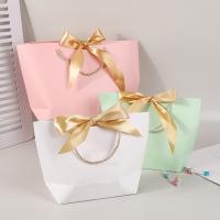 China Small Shopping Custom Paper Gift Bags CMYK 4C Offset Printing With Ribbon Handles for sale