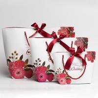 China Recycled Paper Shopping Bags Customized Printing Paperboard Gift Packing Bags for sale