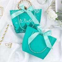 China Recycled Paper Shopping Bags Customized Printing Paperboard Gift Packing Bags for sale