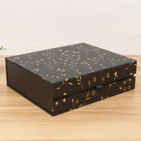 China Folding Gift Box Customized Black Cardboard Cosmetic Packaging Box with Gold and Silver Stamping for sale