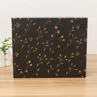 China Folding Gift Box Customized Black Cardboard Cosmetic Packaging Box with Gold and Silver Stamping for sale