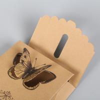 China Custom kraft paper candy box personality black cardboard hollowed window box custom for sale