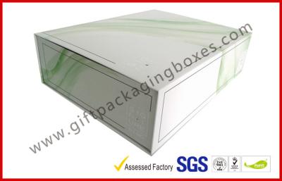 China Cosmetic Magnet Packaging Boxes Debossed and Silver Foiled Logo for sale