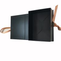 China Cardboard Folding Magnetic Cosmetic Packaging Boxes With Ribbon for sale