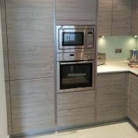 China Custom Melamine Wood Grain Kitchen Cabinets 18mm Plywood DTC Soft Close Hinges for sale