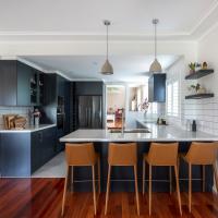 China Matte Black PVC Kitchen Cabinet U Shape with Island 18mm HMR Core Sintered Stone Benchtop for sale