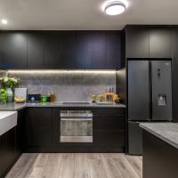 China Simple L Shaped Kitchen Units Luxury Modular Dark Black Solid Wood Kitchen Cupboard Set for sale
