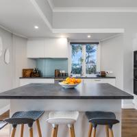 China Modern Matte White Lacquer Plywood Kitchen Cabinet L-Shape with 18mm Carcass and 12mm Sintered Stone Benchtop for sale
