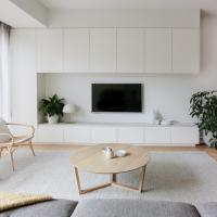 China Matte Lacquer Wall Mounted TV Cabinet Modern Simple High Gloss White TV Bench for sale