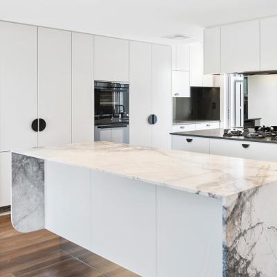 China PVC Kitchen Cabinet with Semicircular Handle 18mm Plywood Carcass 20mm Granite Countertop for sale