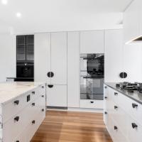 China PVC Kitchen Cabinet with Semicircular Handle 18mm Plywood Carcass 20mm Granite Countertop for sale