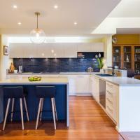 China Custom Made PVC Kitchen Cabinet White Plain And Black Wood Grain for sale
