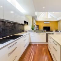 China Custom Made PVC Kitchen Cabinet White Plain And Black Wood Grain for sale