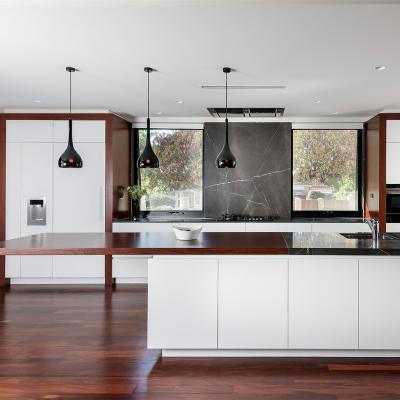 China Custom White PVC Vinyl Flat Panel Handless Kitchen Cabinets 18mm MDF Hettich Hinges for sale