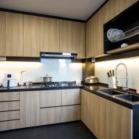 China Wood Grain Melamine Base Kitchen Cabinet Set 580mm with Drawer and Sink for Small Spaces for sale
