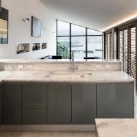 China Modern Luxury Dark Grey Glossy Lacquer Kitchen Cabinet 18mm Moisture Proof HMR for sale