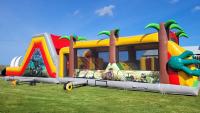 China Unisex Commercial Inflatable Jurassic Dinosaur Obstacle Course for Kids and Adults for sale