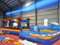 China Inflatable Blue Tropical Palm Trees Marble Water Slide Perfect for Commercial Rental for sale