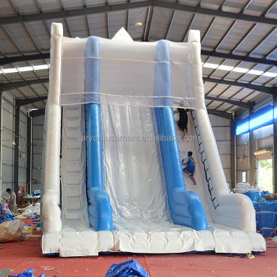 China Large White Snow Mountain Double Slip And Slide Inflatable Water Slide For Adult Size for sale