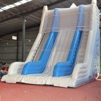 China Large White Snow Mountain Double Slip And Slide Inflatable Water Slide For Adult Size for sale