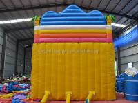 China Outdoor Park Game 2-Lane Tropical Palm Tree PVC Inflatable Dinosaur Jump Bounce Slide for sale
