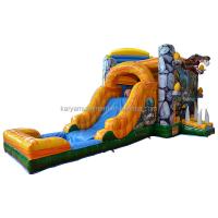 China Features PORTABLE Inflatable Jungle Dino Bouncer House with Slide and Unisex Design for sale