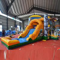 China Features PORTABLE Inflatable Jungle Dino Bouncer House with Slide and Unisex Design for sale