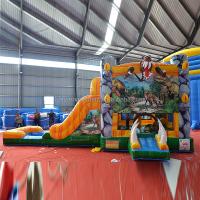 China Features PORTABLE Inflatable Jungle Dino Bouncer House with Slide and Unisex Design for sale