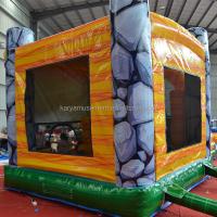 China Features PORTABLE Inflatable Jungle Dino Bouncer House with Slide and Unisex Design for sale
