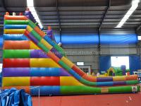 China 19ft Wide 2-Lane Inflatable Building Block Wet and Dry Slide for Kids Park Party Outdoor for sale
