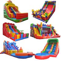 China Customized Color Building Block Slide Inflatable Wet and Dry Jumping Slide for Outdoor Fun for sale