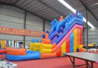 China 2023 Customized Outdoor Inflatables PVC Colorful Building Blocks Air Jumping Slide for sale
