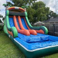 China Commercial Grade Inflatable Water Slide with Double Lane and Tropical Palm Theme for sale