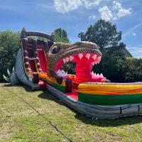 China Customized PVC Inflatable Jumping Slide Jurassic Dinosaur Theme Water Slide with Pool for sale