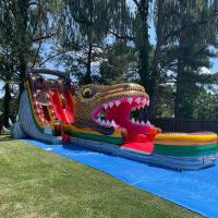 China Customized PVC Inflatable Jumping Slide Jurassic Dinosaur Theme Water Slide with Pool for sale