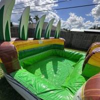 China Max Capacity 100-500kg Large Jumping Jungle Dino Water Slide for Commercial Rental for sale