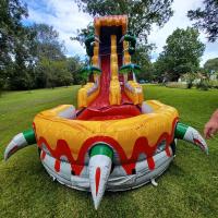 China Large Adult Inflatable Slides 36ft Thrilling Jumping Game with Tropical Dinosaur Theme for sale