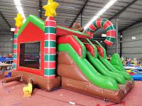 China Indoor/Outdoor Commercial Inflatable Christmas Bounce House with Double Slides and Blower for sale