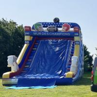 China Commercial Renting Inflatable Water Slide with Rugby Player Theme and Customized Color for sale