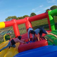 China Unleash the Fun with Human Bungees Running and Hungry Hippo Chow Down Inflatable Game for sale