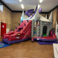 China Red Dinosaur Bouncy Castle with Slide How to Train Your Dragon Inflatable Bounce House for sale